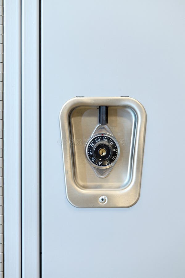 A High School locker lock stock image. Image of metal - 162343941