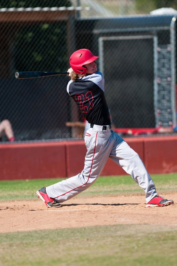 Teen baseball boy on base stock photo. Image of active - 30324724