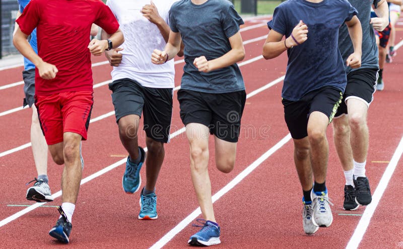 High School Runners Running Together on a Track Stock Image - Image of ...