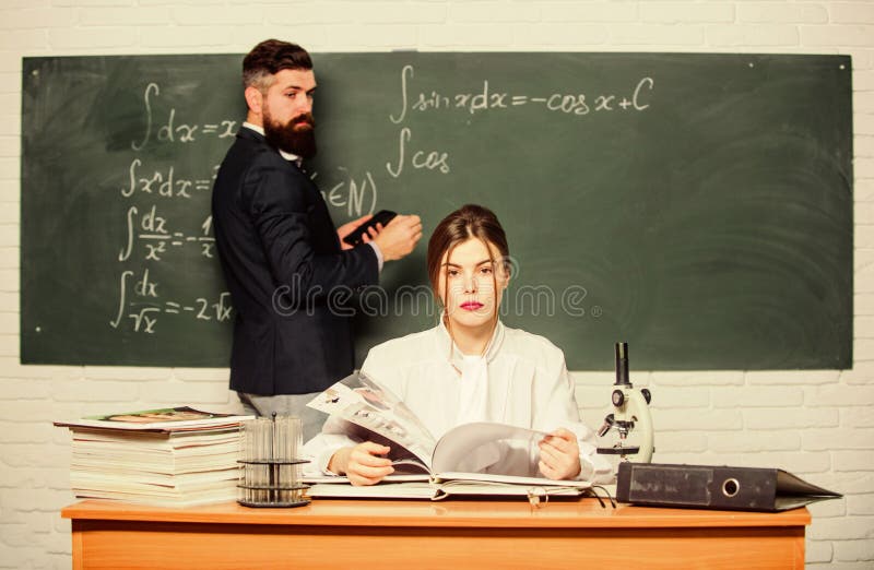 High School. Solving Task. Man Writing on Chalkboard Math Formulas ...