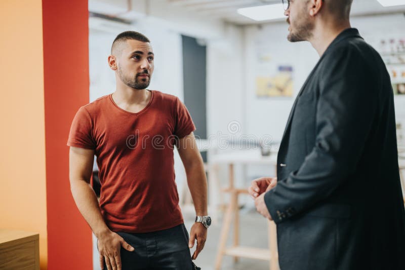 High School Student Consulting Professor between Classes in Bright ...