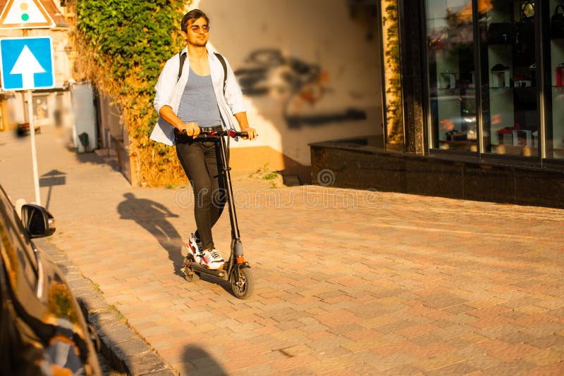 The High School Student Goes To Study on a Scooter Stock Image - Image ...