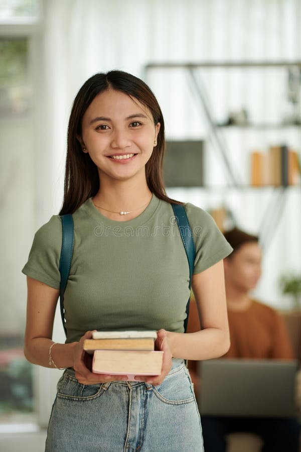 High School Student Holding Books Stock Image - Image of stack, zoomer ...