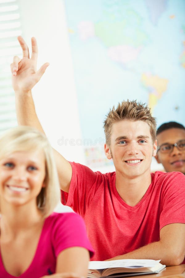 High School: Student Raising Hand with Answer Stock Photo - Image of ...