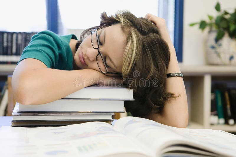 High School Student Sleeping in Library Stock Photo - Image of notes ...