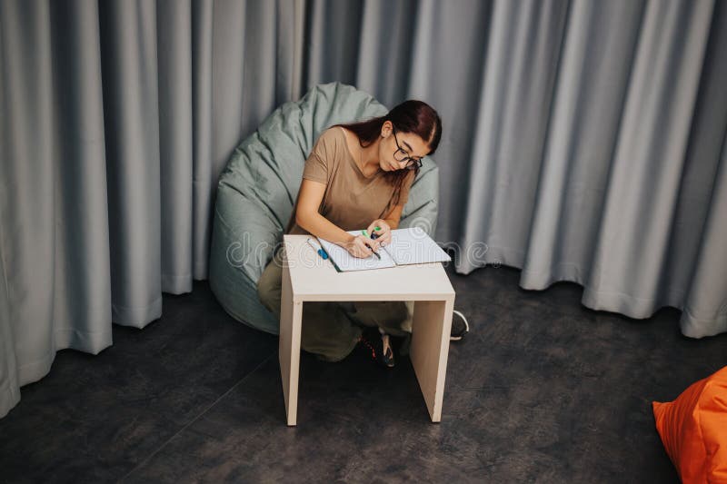 High School Student Studying in a Cozy Classroom Setting Stock Image ...