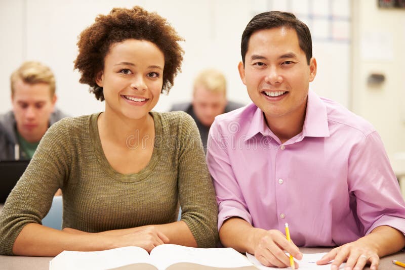 High School Student and Teacher Using Digital Tablet Stock Image ...