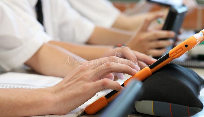 Students Using Digital Technology in the Classroom. Stock Image - Image ...