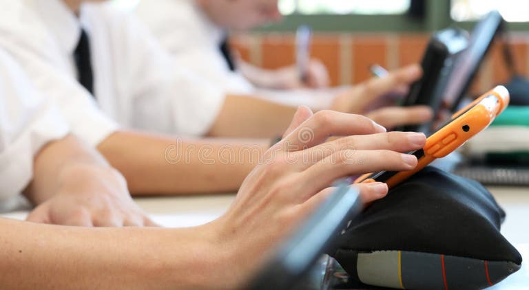 Students Using Digital Technology in the Classroom. Stock Photo - Image ...