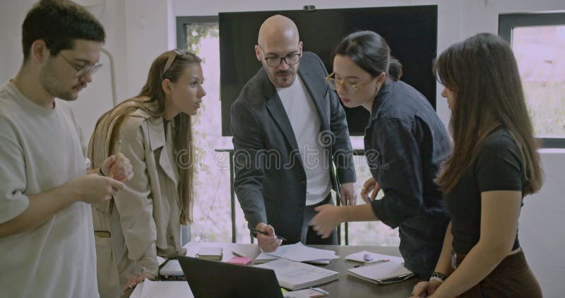 High School Students Collaborate on a Project with Teacher S Guidance ...