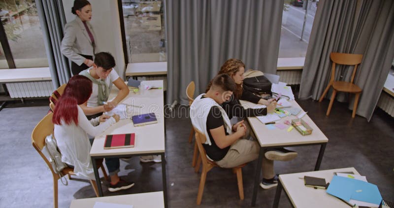 High School Students Collaborate on School Tasks in the Classroom ...