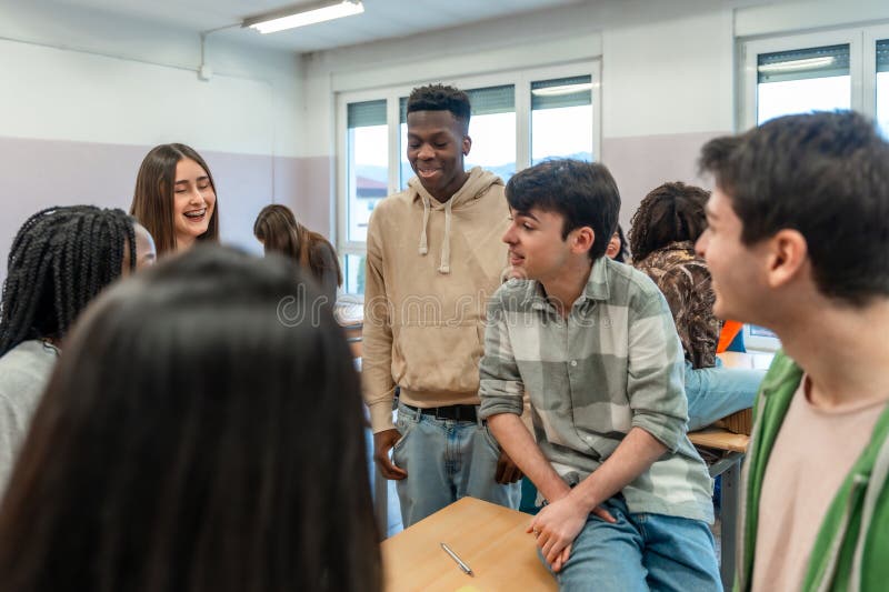 High School Students Collaborating on a Project in Classroom Stock ...