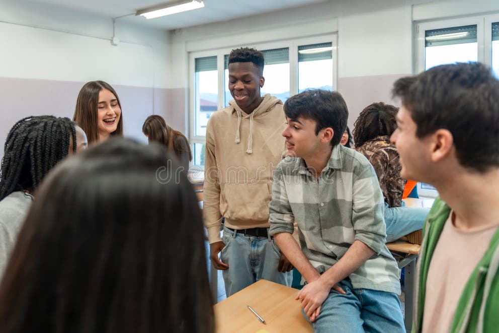 High School Students Collaborating on a Project in Classroom Stock ...