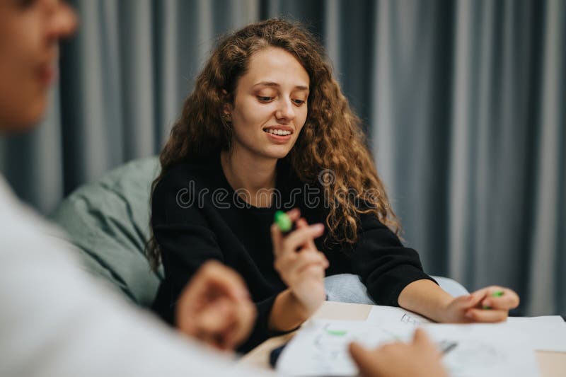 High School Students Collaboratively Working on Class Assignments Stock ...