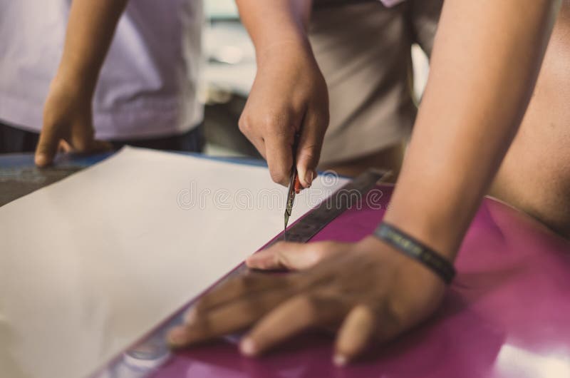 High School Students are Cutting Prints and Stickers Using Knife Stock ...