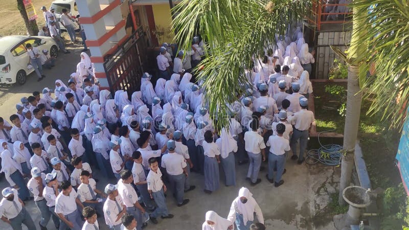 High School Students Enter the School Gate. a Crowd of High School ...