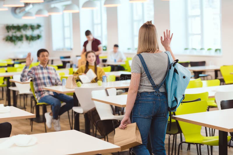 High School Students Greeting Their Classmate Stock Photo - Image of ...