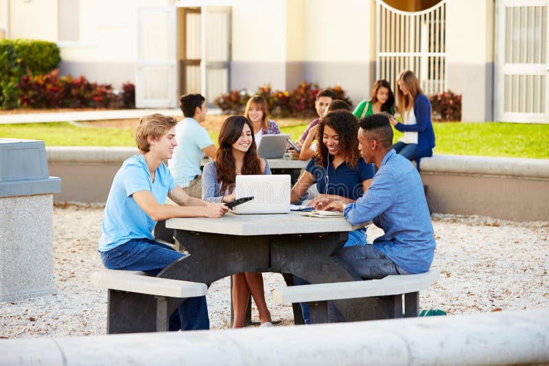 High School Students Hanging Out on Campus Stock Image - Image of male ...
