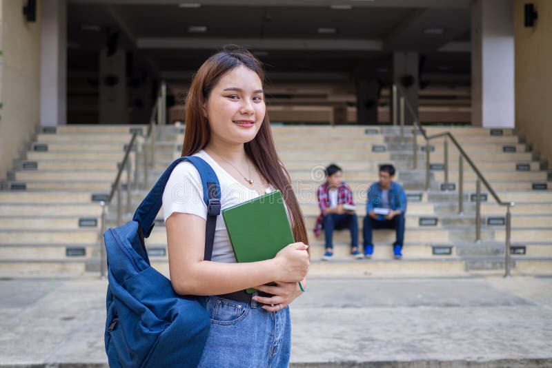 High School Students Holding Books Inside the School Stock Image ...