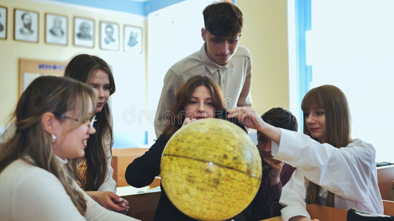 High School Students Looking at the Yellow Globe of the Moon. Stock ...