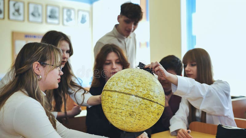 High School Students Looking at the Yellow Globe of the Moon. Stock ...