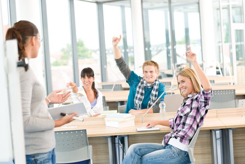 High School Students Raising Hands Stock Image - Image of teacher ...