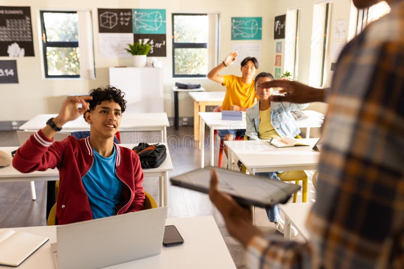 In High School, Students Raising Hands To Answer Teacher S Question in ...