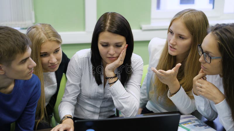 High School Students Sitting in Front of a Computer Monitor and Having ...