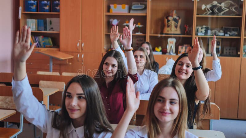 High School Students Stretch Their Hands in the Lesson. Russian School ...