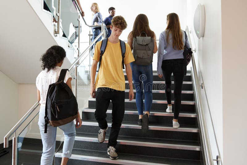 High School Students Walking on Stairs between Lessons in Busy College ...