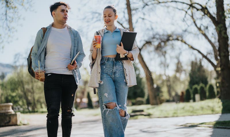 High School Students Walking and Studying Together Outdoors on Campus ...