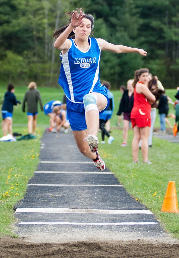 Teen Boy Doing Long Jump at Track and Field Meet Editorial Stock Photo ...