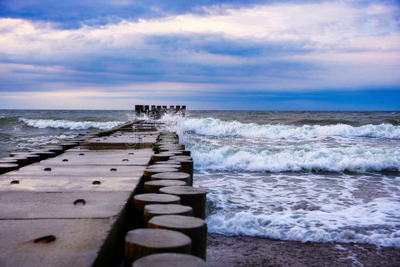 High Sea Waves Crash Against the Breakwater Stock Photo - Image of rest ...