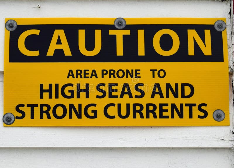 High Seas and Strong Currents Caution Sign Stock Photo - Image of high ...
