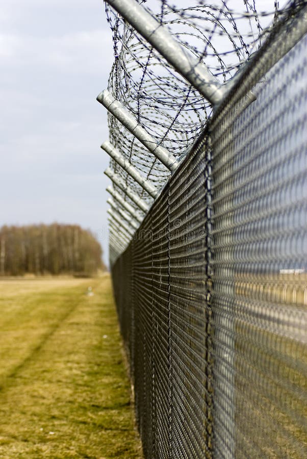 High security fence stock image. Image of barb, high - 13512569