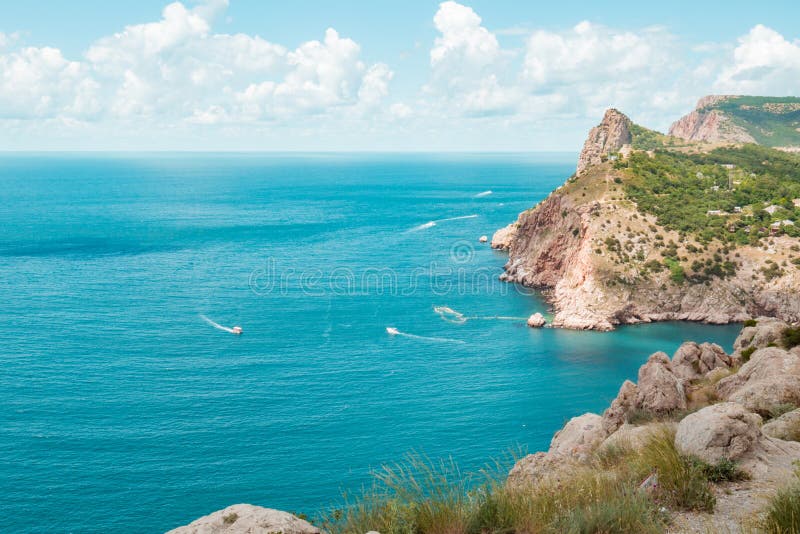 A High Sheer Cliff, Beautiful Blue Sea and Sky. Stock Photo - Image of ...