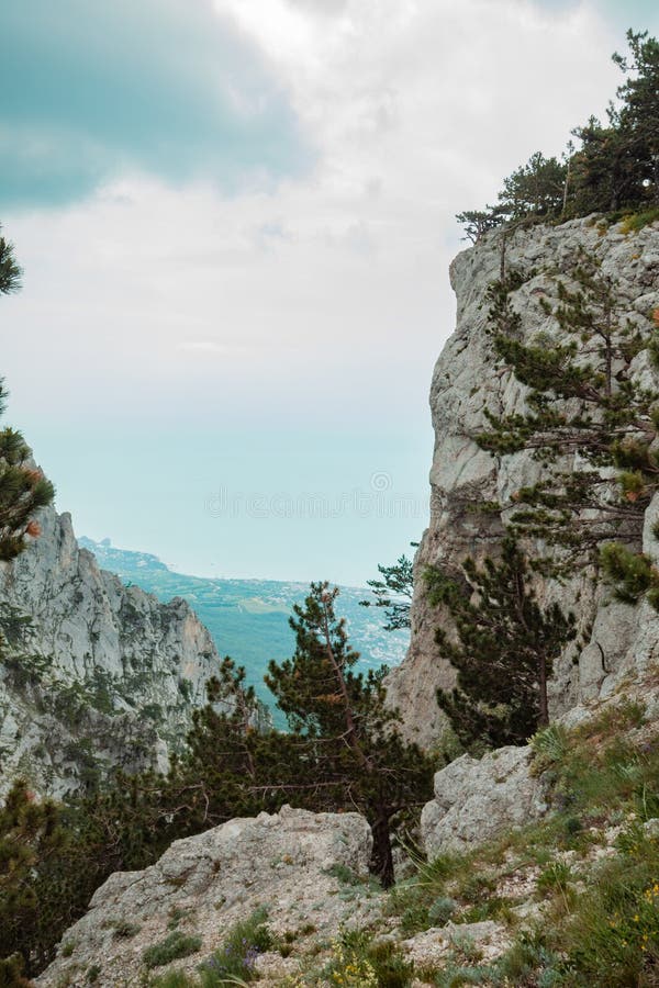 A High Sheer Cliff, Beautiful Blue Sea and Sky. Stock Photo - Image of ...
