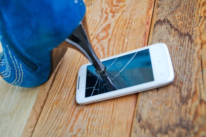 High Shoe Crushing a Mobile Phone. Stock Photo - Image of cracked ...