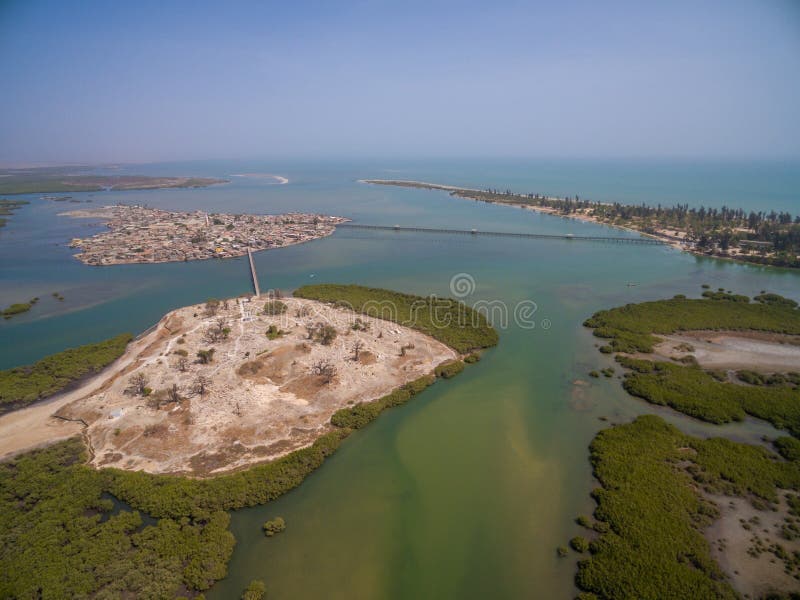 High Shot of Islands in the Sea with a Bridge in the Background Under a ...