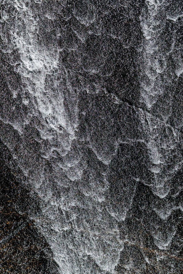 High Shutter Speed Photo of Water Flowing on a Rock Stock Photo - Image ...