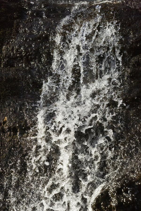 High Shutter Speed Reveals Patterns in a Splashing Waterfall Stock ...