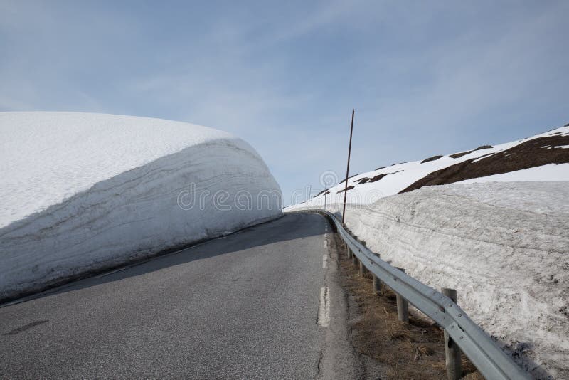 High Snow Wall Along a Mountain Pass Road Vikafjellet Stock Photo ...