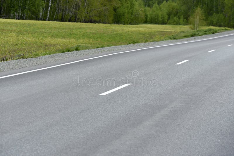 High-speed Asphalt Road in the Spring Forest. Country Road Stock Image ...