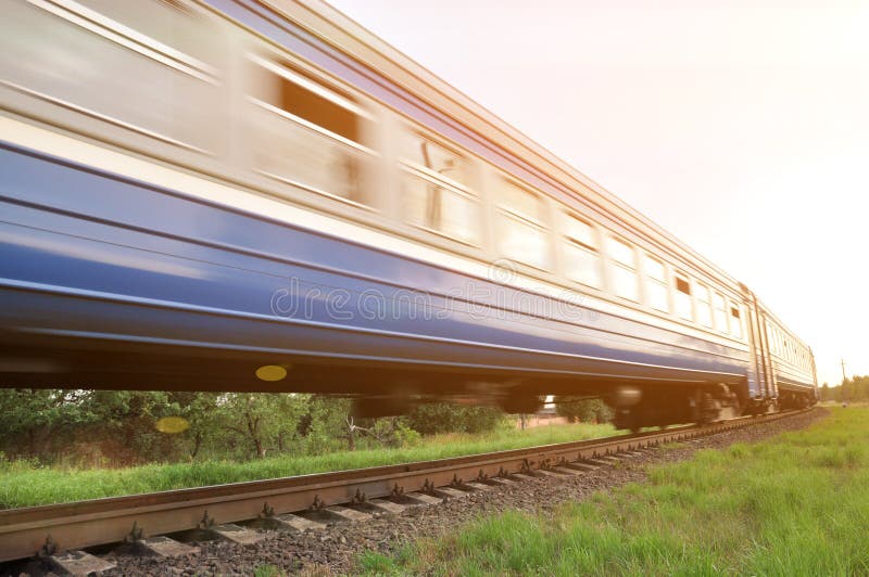 A High-speed Diesel Train Moves Quickly by Rail. Blur Stock Photo ...