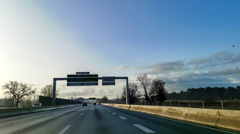 High Speed Highway with Signage Against Blue Sky Stock Image - Image of ...