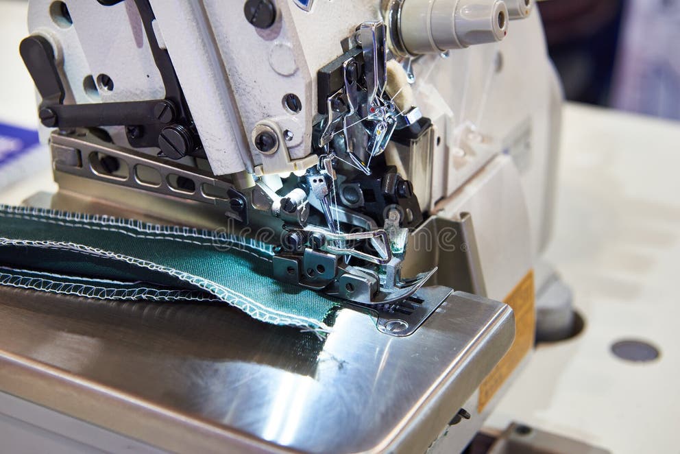 High Speed Industrial 3 Thread Overlock Sewing Machine Stock Photo ...