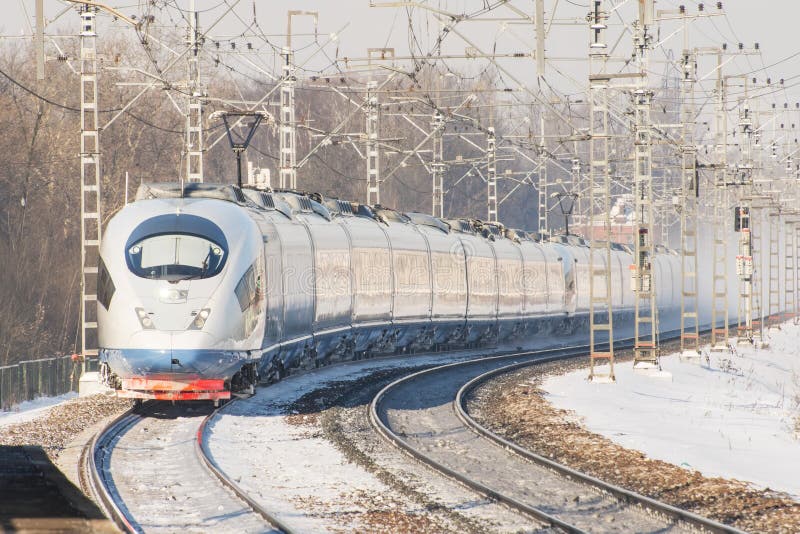 High Speed Long Train Approaches Turn To the Station Platform at Winter ...