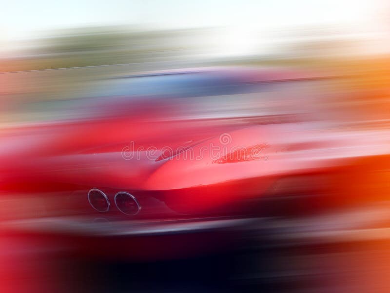 High Speed Red Sport Car in the Motion. Motion Blur Background. Stock ...