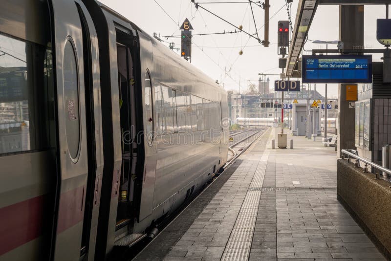 High Speed Train with Opened Automatic Doors at the Platform Railway ...