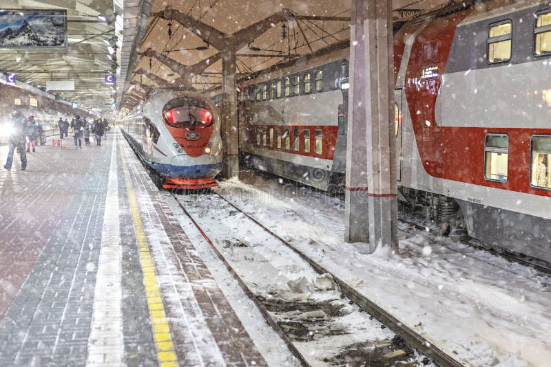 A High-speed Train Stands on the Platform of the Station Waiting for ...